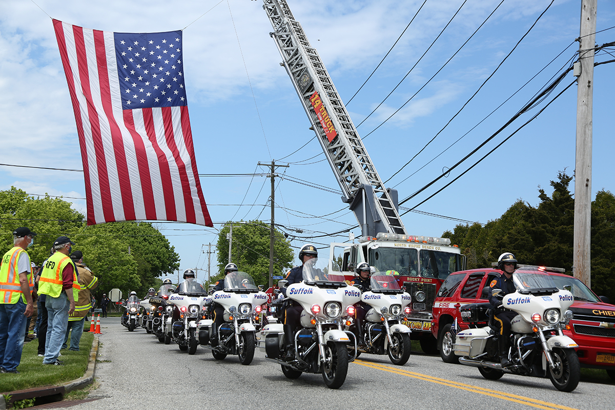 Riverhead officer injured in crash receives hero’s welcome home ...