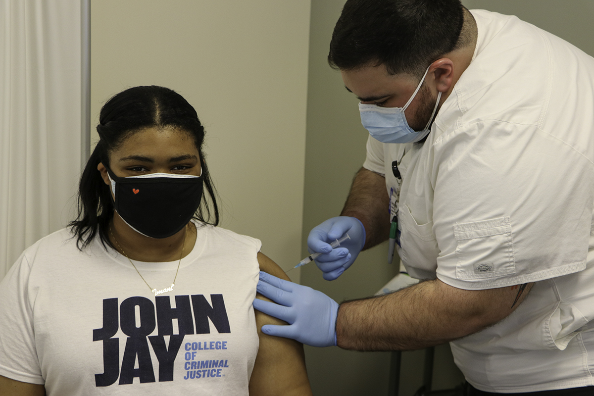 Riverhead teen receives first vaccine at PBMC as eligibility expands to ...