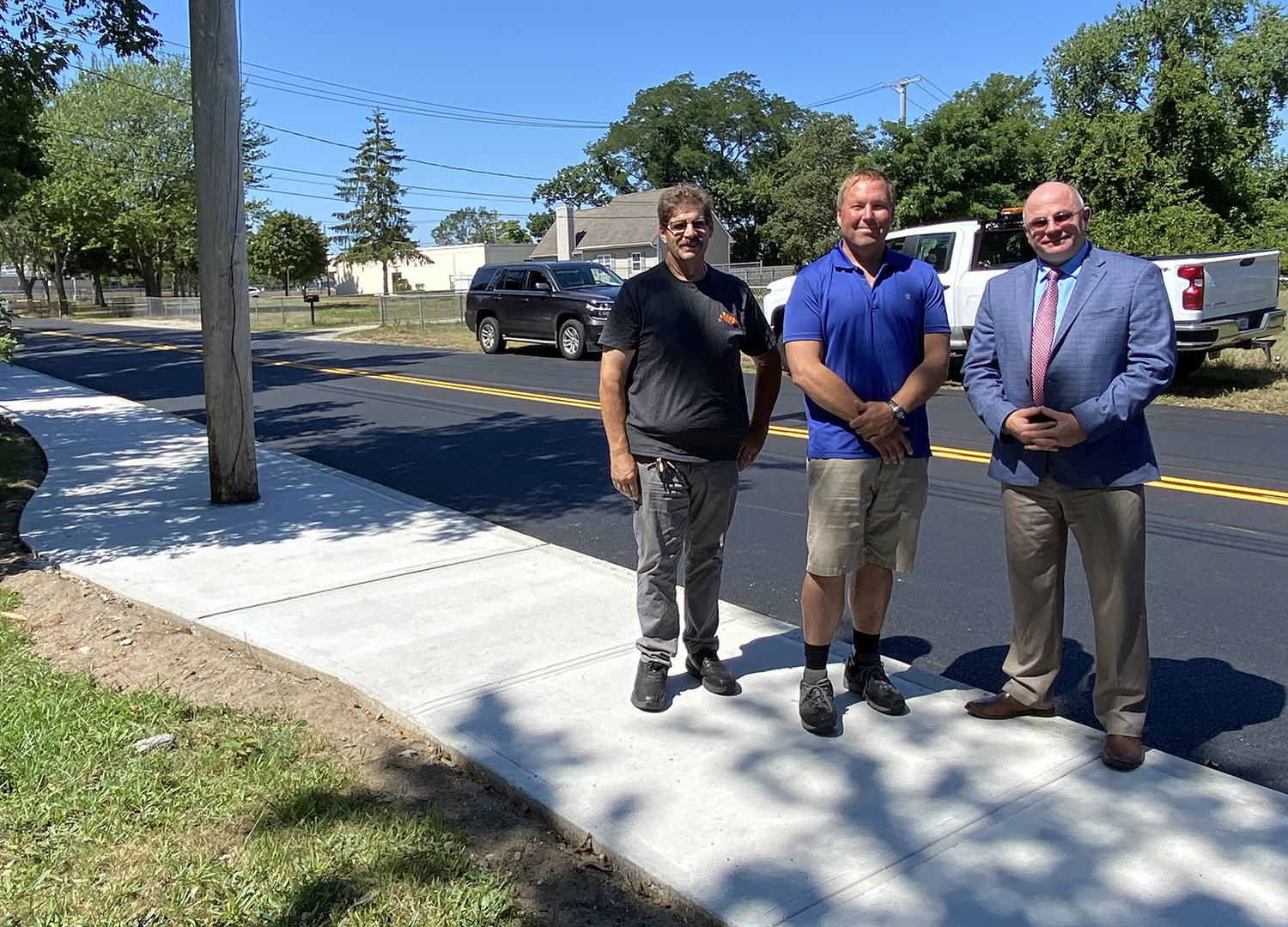 Highway department completes sidewalk project near school - Riverhead ...