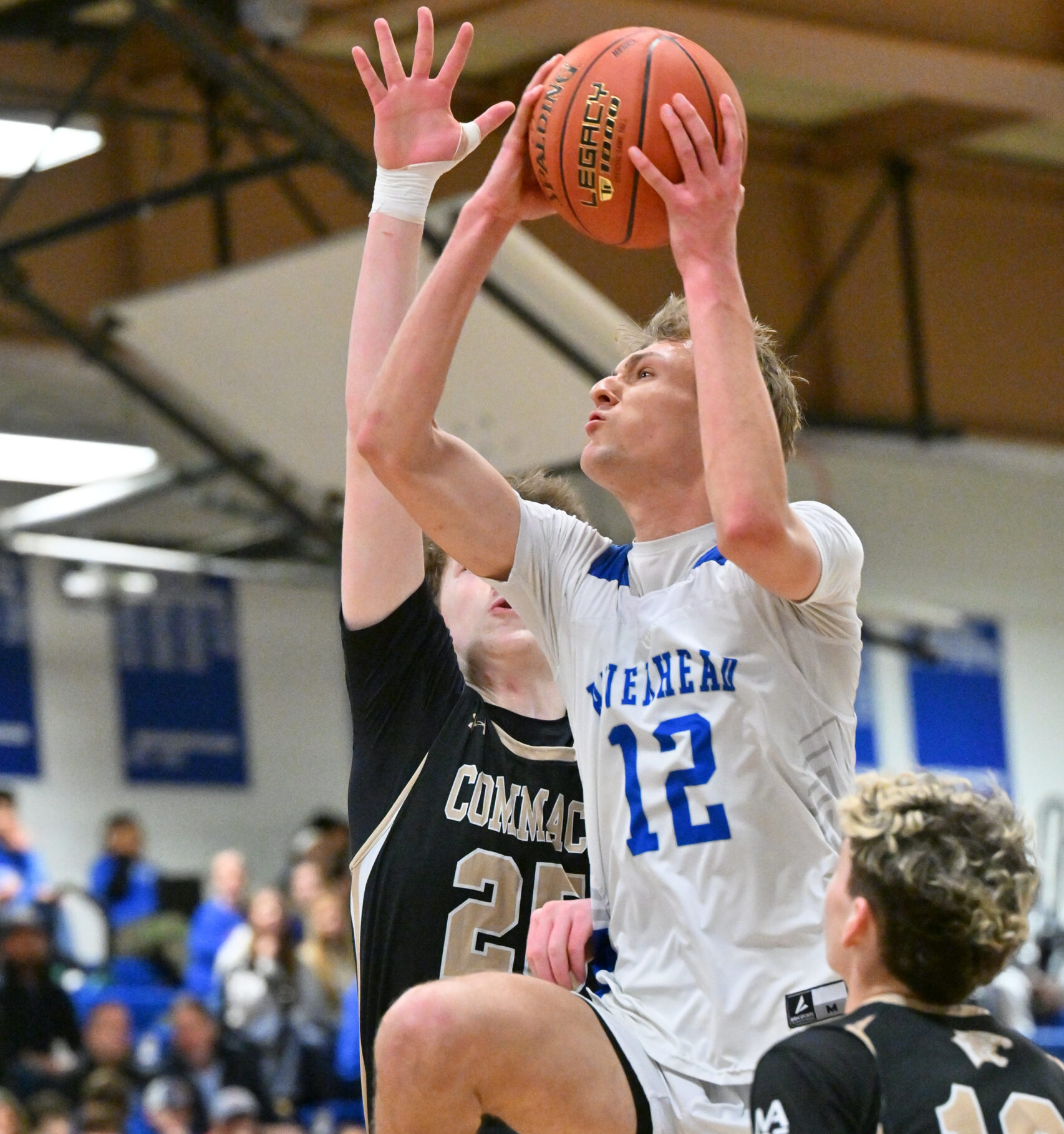 Blue Waves boys squad advances to next round of basketball playoffs ...