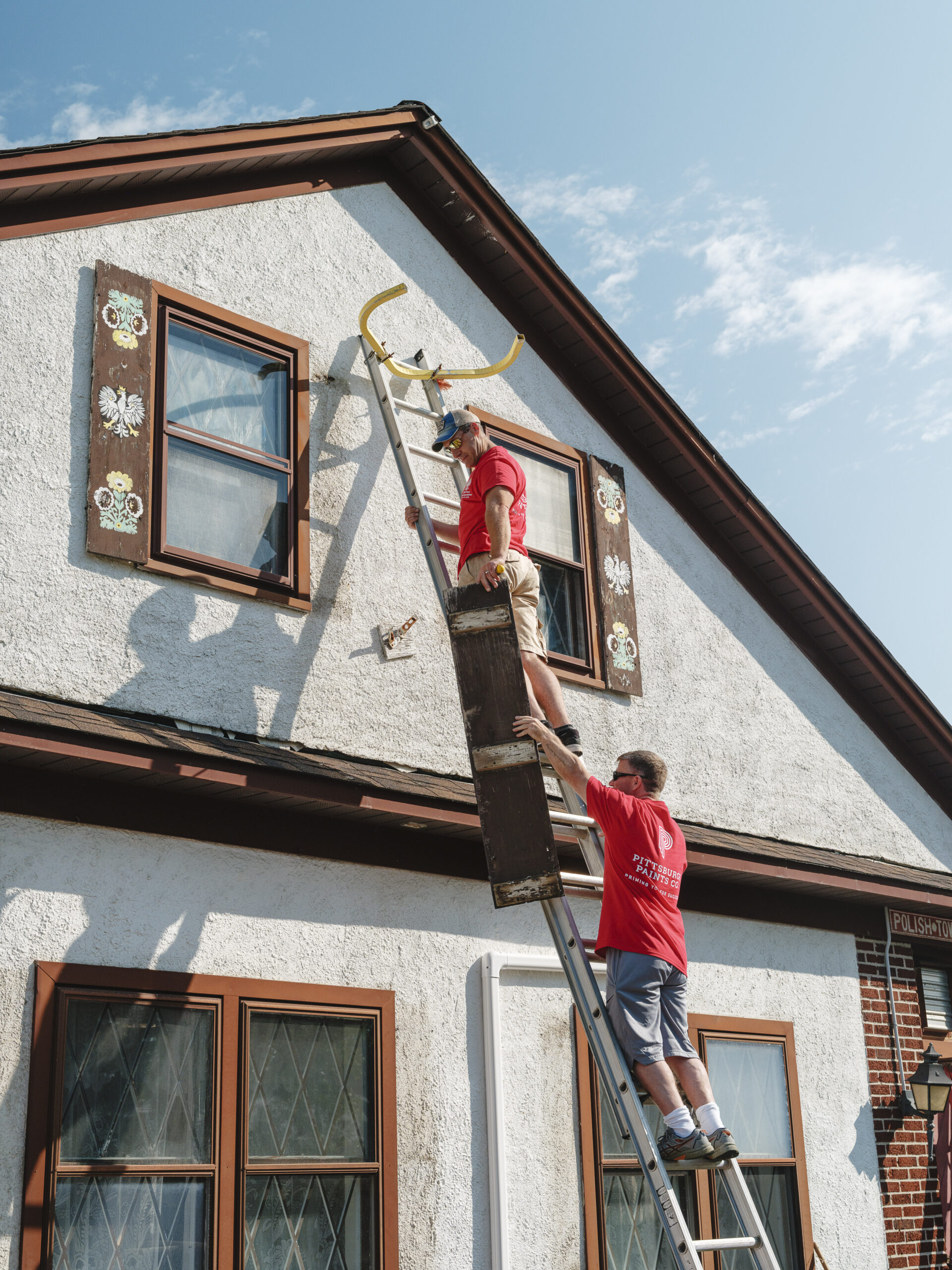 Polish Town Civic volunteers paint headquarters - Riverhead News Review