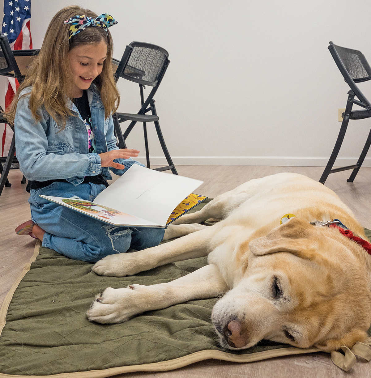 For kids learning to read, sharing a story with a therapy dog can be a ...