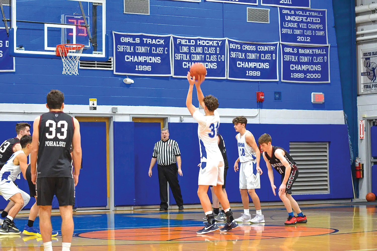 Shelter Island varsity basketball team takes on Southold: Bench steps ...
