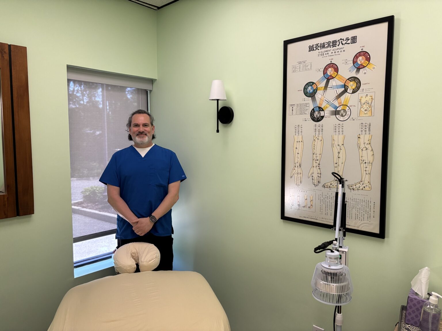 Peter Scolaro offers acupuncture, steps away from where he got his start